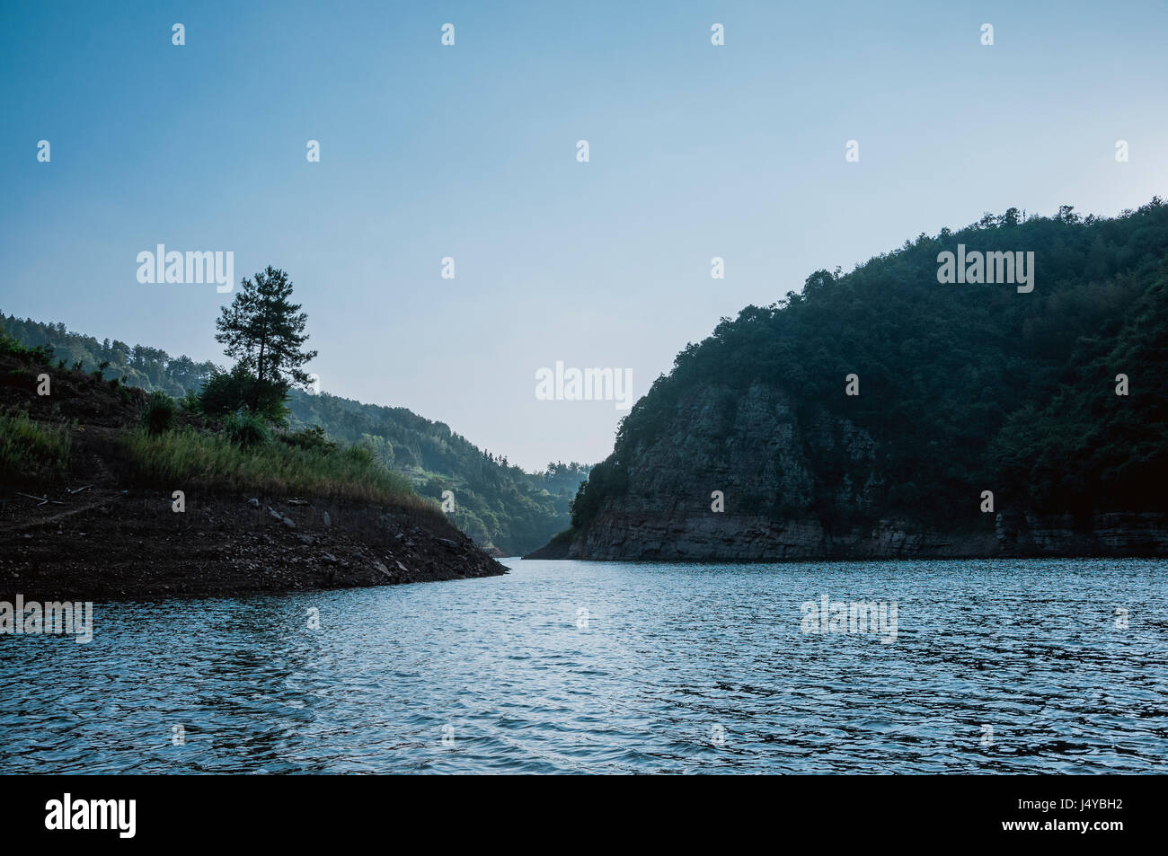 The reservoir scenery with blue sky in summer Stock Photo - Alamy