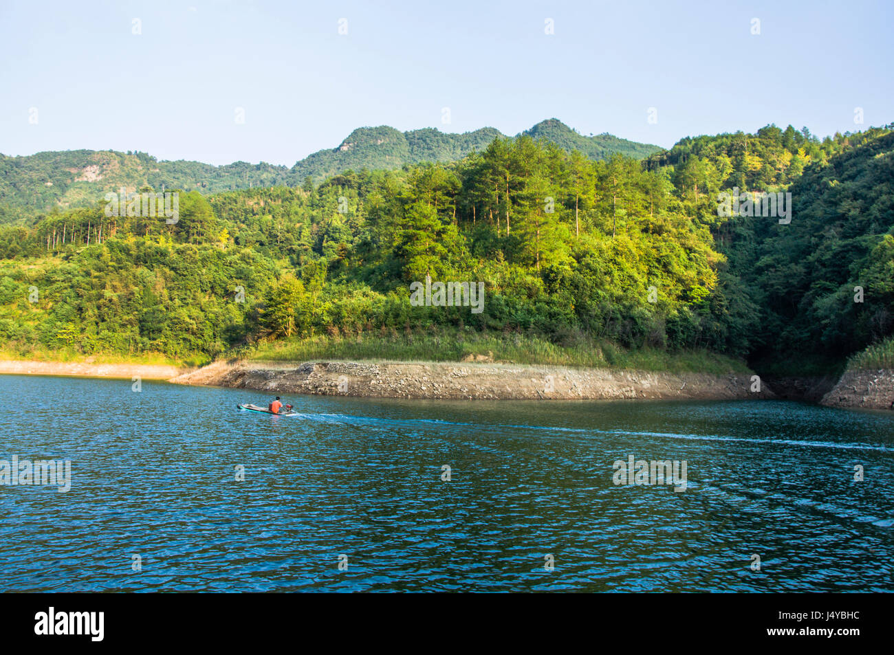 The reservoir scenery with blue sky in summer Stock Photo - Alamy