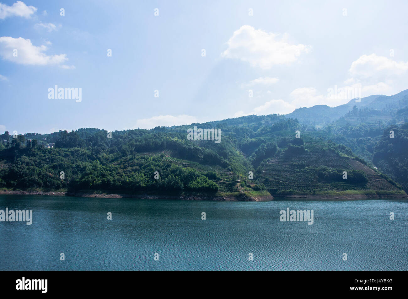 The reservoir scenery with blue sky in summer Stock Photo - Alamy
