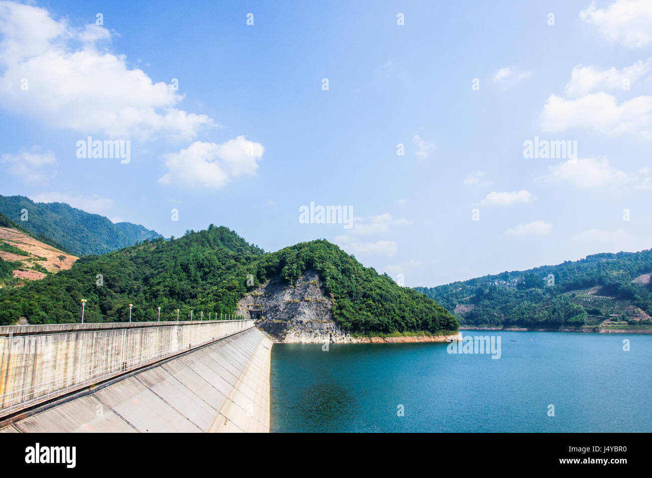 The reservoir scenery with blue sky in summer Stock Photo - Alamy
