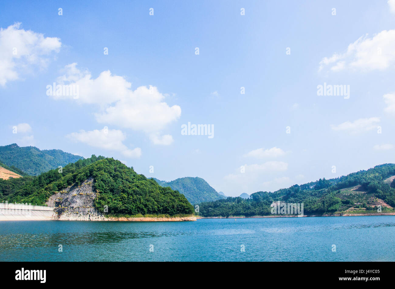 The reservoir scenery with blue sky in summer Stock Photo - Alamy