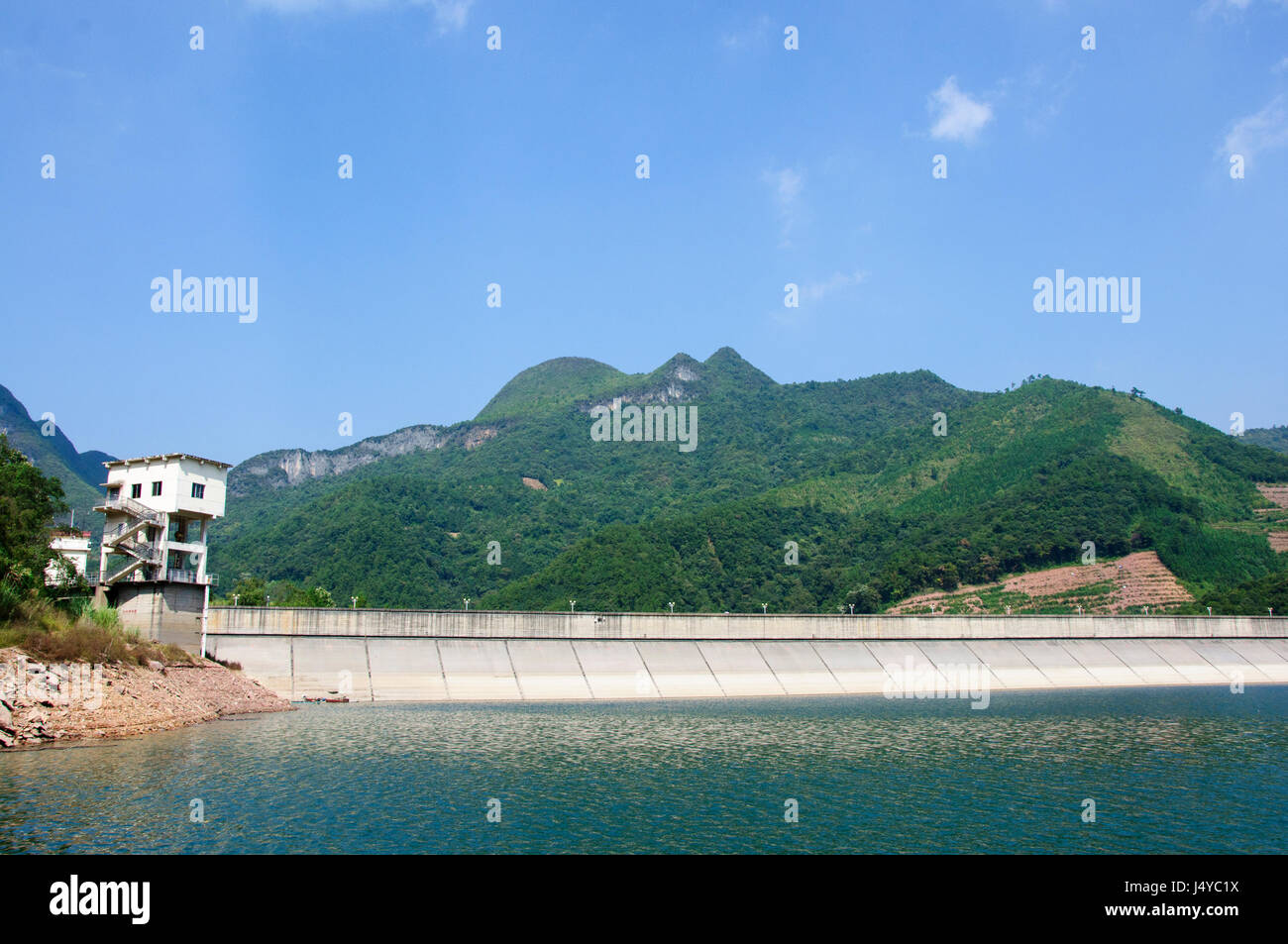 The reservoir scenery with blue sky in summer Stock Photo - Alamy