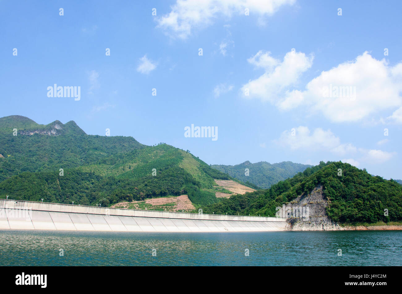 The reservoir scenery with blue sky in summer Stock Photo - Alamy
