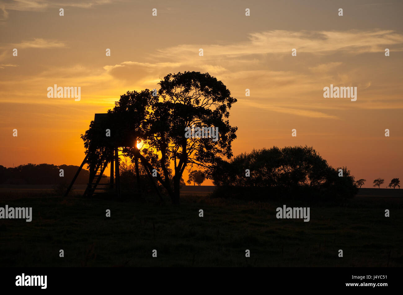 Silhouette of a Watchtower at Sunset Stock Photo - Alamy