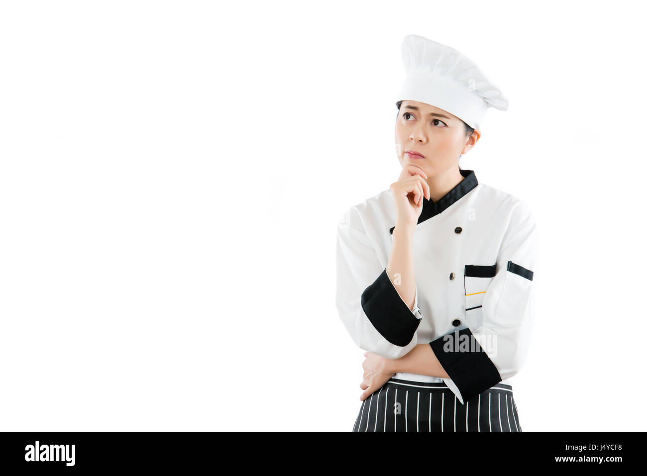 mixed race asian beautiful female chef is thinking what to cook get ...