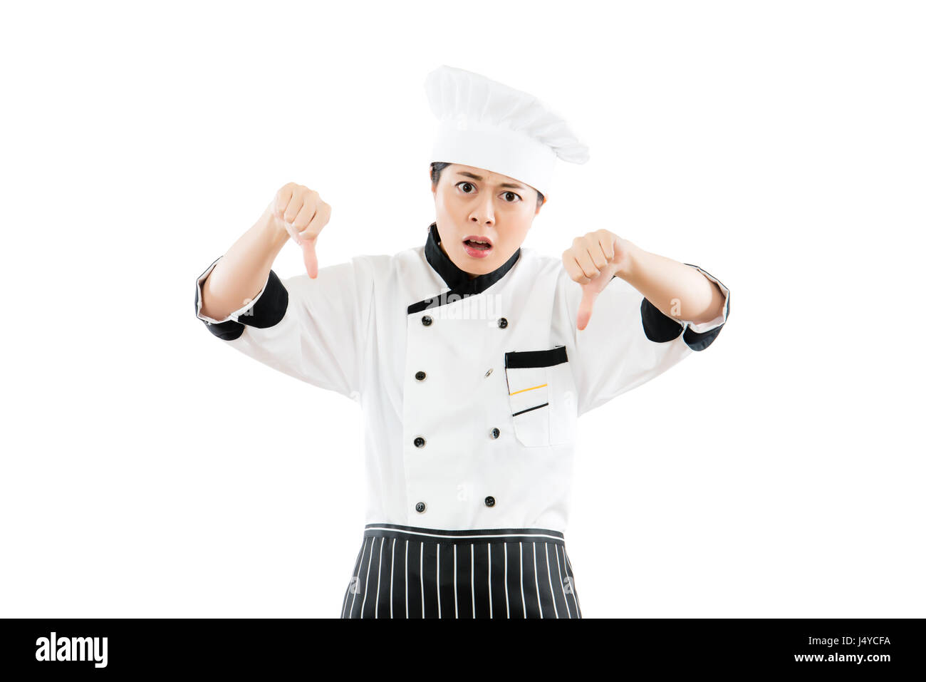 mixed race asian woman chef showing a bad dislike hand signal gesture ...