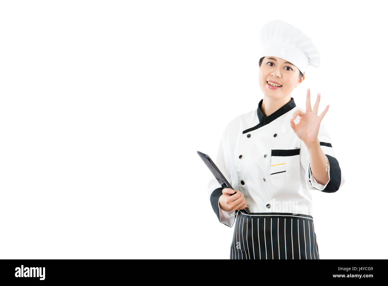 happy asian woman chef cook holding digital tablet pad computer and ...