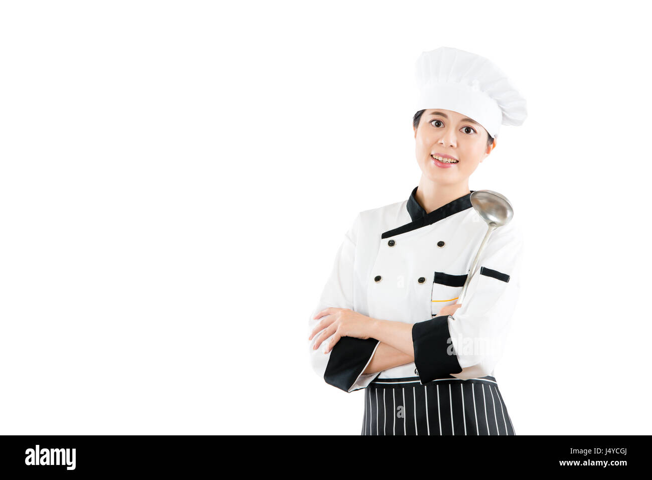 chef holding a silver stainless steel spoon standing in copyspace hands ...