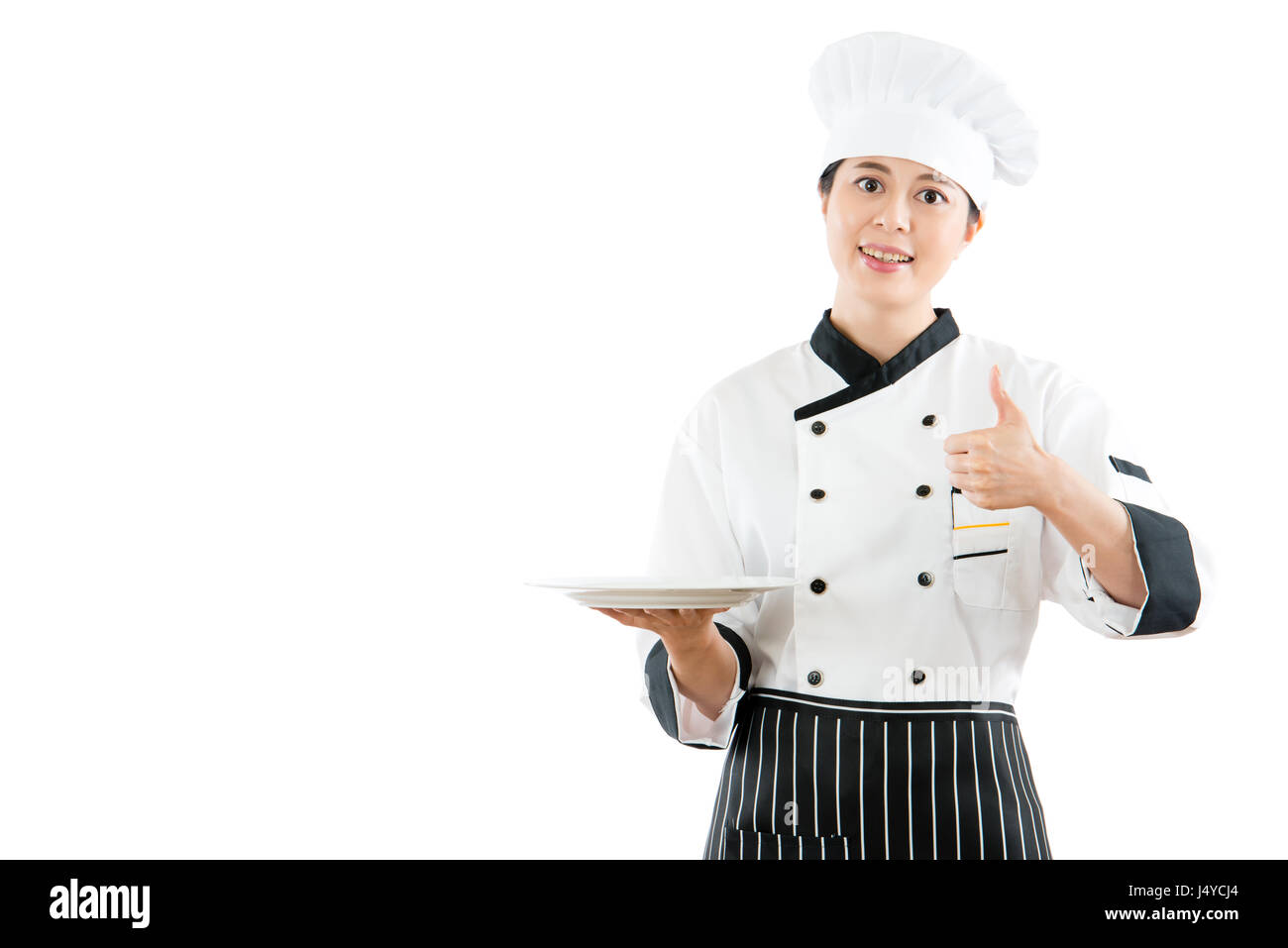 mixed race asian chinese smiling chef making thumbs up gesture standing ...
