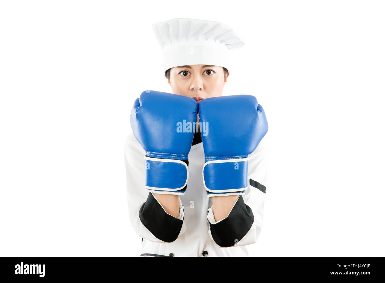 confident beautiful cooking woman with boxing gloves wearing chef ...