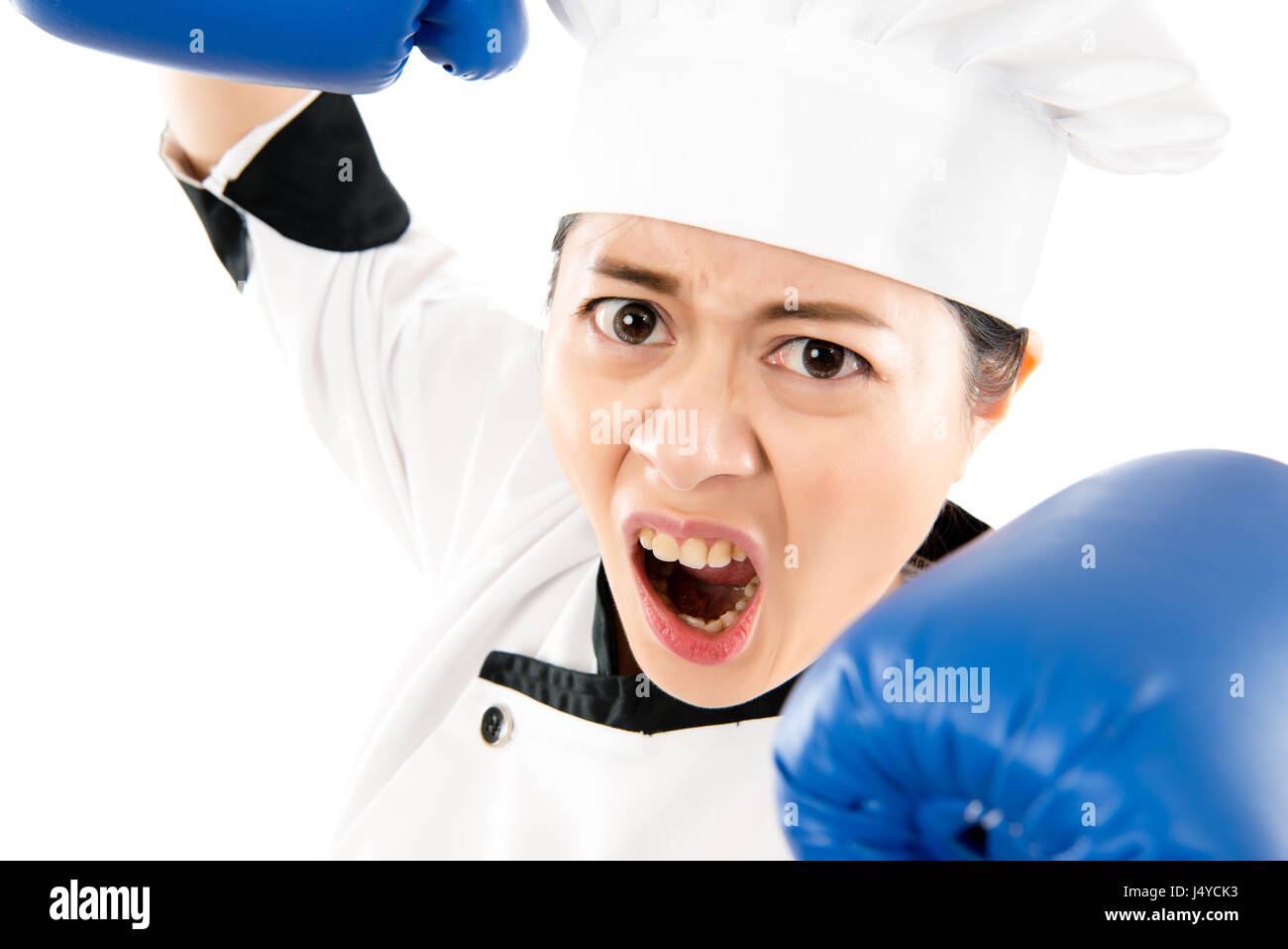 closeup photo of mixed race asian chinese crazy cooking chef showing ...