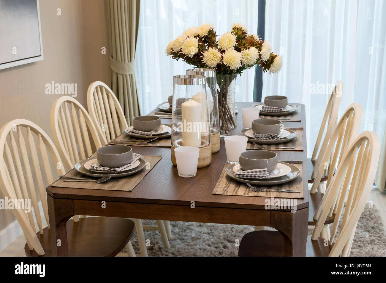 dining table and comfortable chairs in modern home with elegant table ...