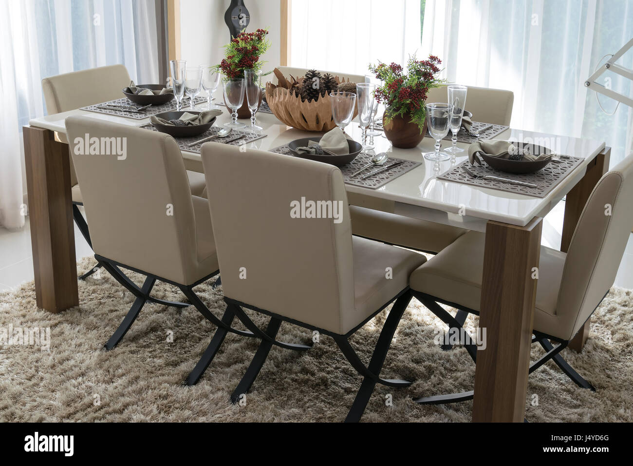 dining table and comfortable chairs in modern home with elegant table ...