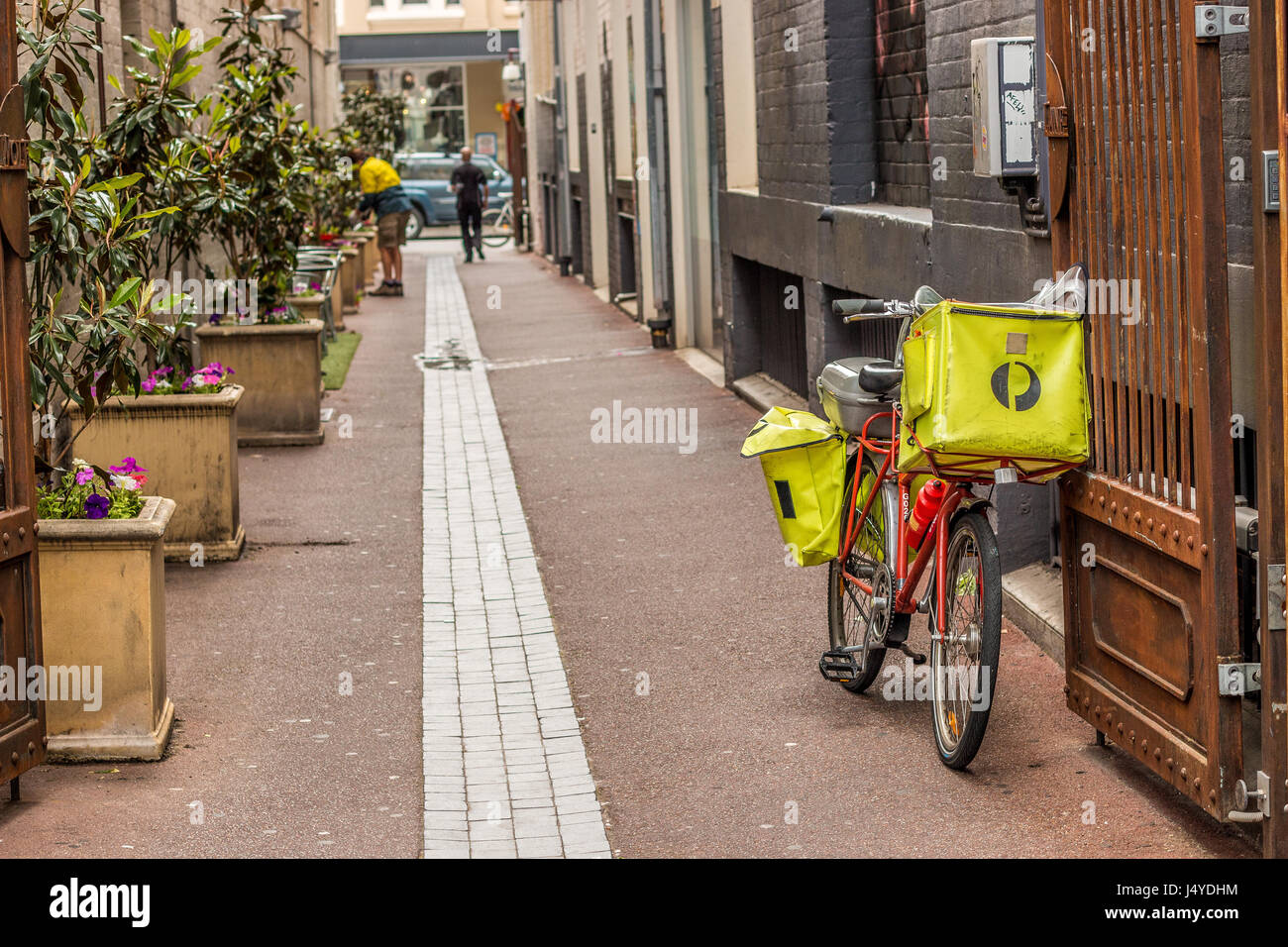 Postal bike in alleyway, Perth Stock Photo - Alamy