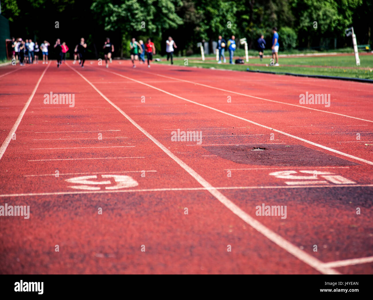 runners approaching the finish line of a race Stock Photo - Alamy