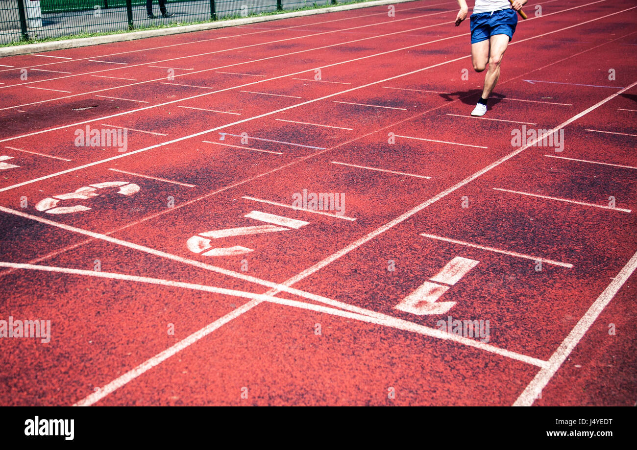 runners approaching the finish line of a race Stock Photo - Alamy