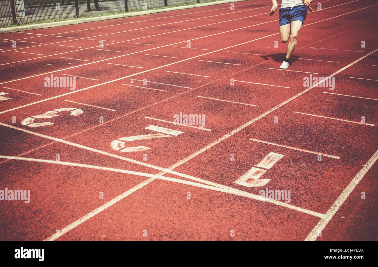 runners approaching the finish line of a race Stock Photo - Alamy
