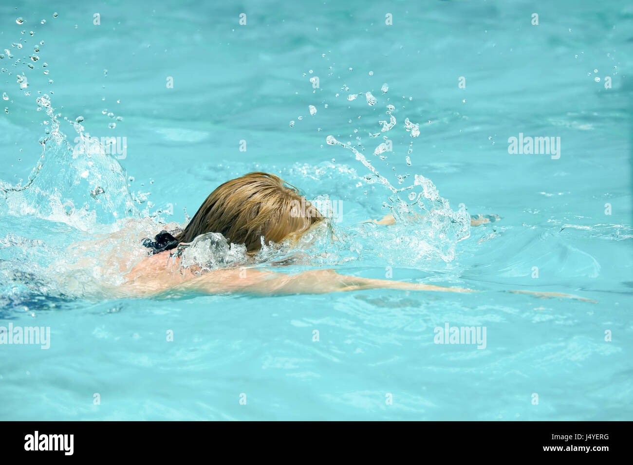 swimmer face down in a swimming pool Stock Photo - Alamy