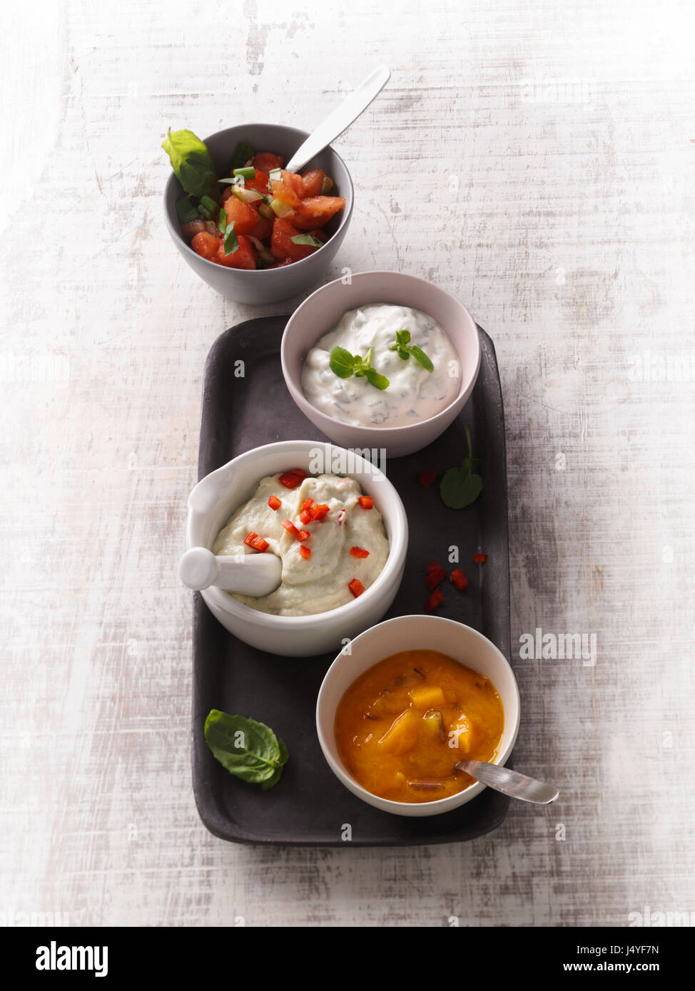 Different sorts of dips and salsas Stock Photo - Alamy