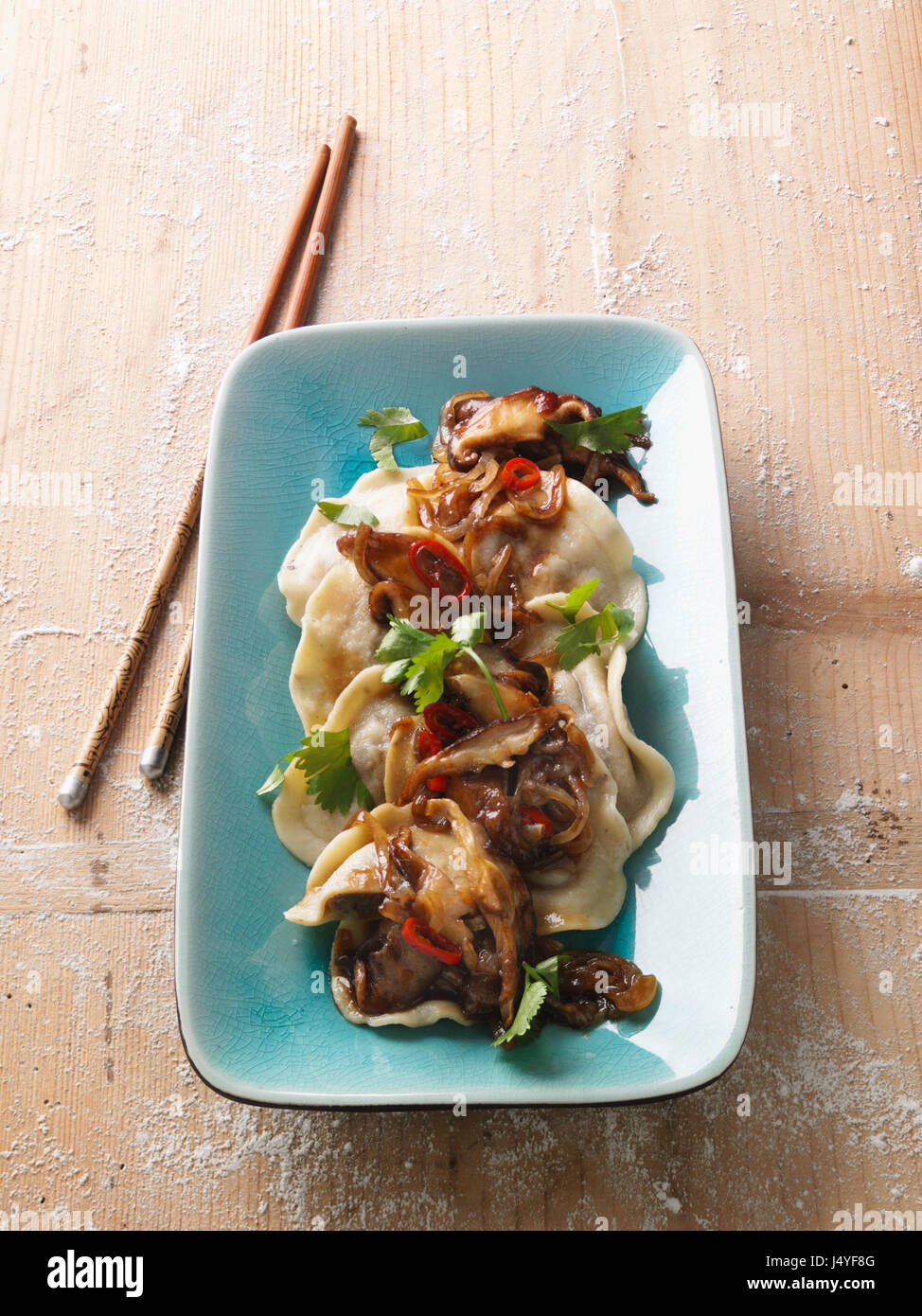 Asian ravioli with mushrooms Stock Photo - Alamy