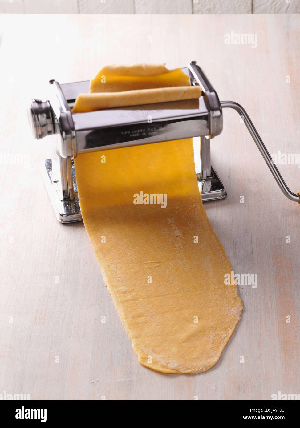 Roll out machine hi-res stock photography and images - Alamy