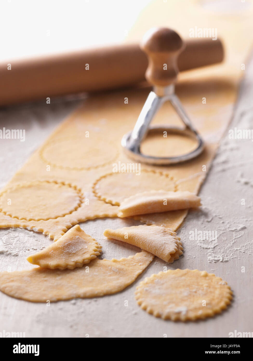 Step Ravioli preparation: Cut ravioli with a pasta stamp Stock Photo ...