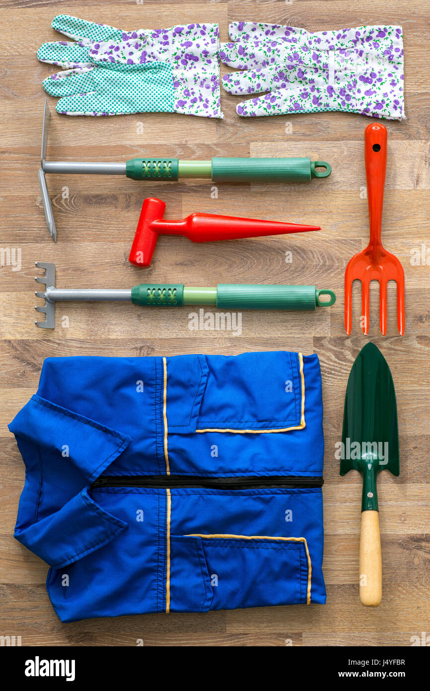 close-up garden tools on wooden texture background Stock Photo - Alamy