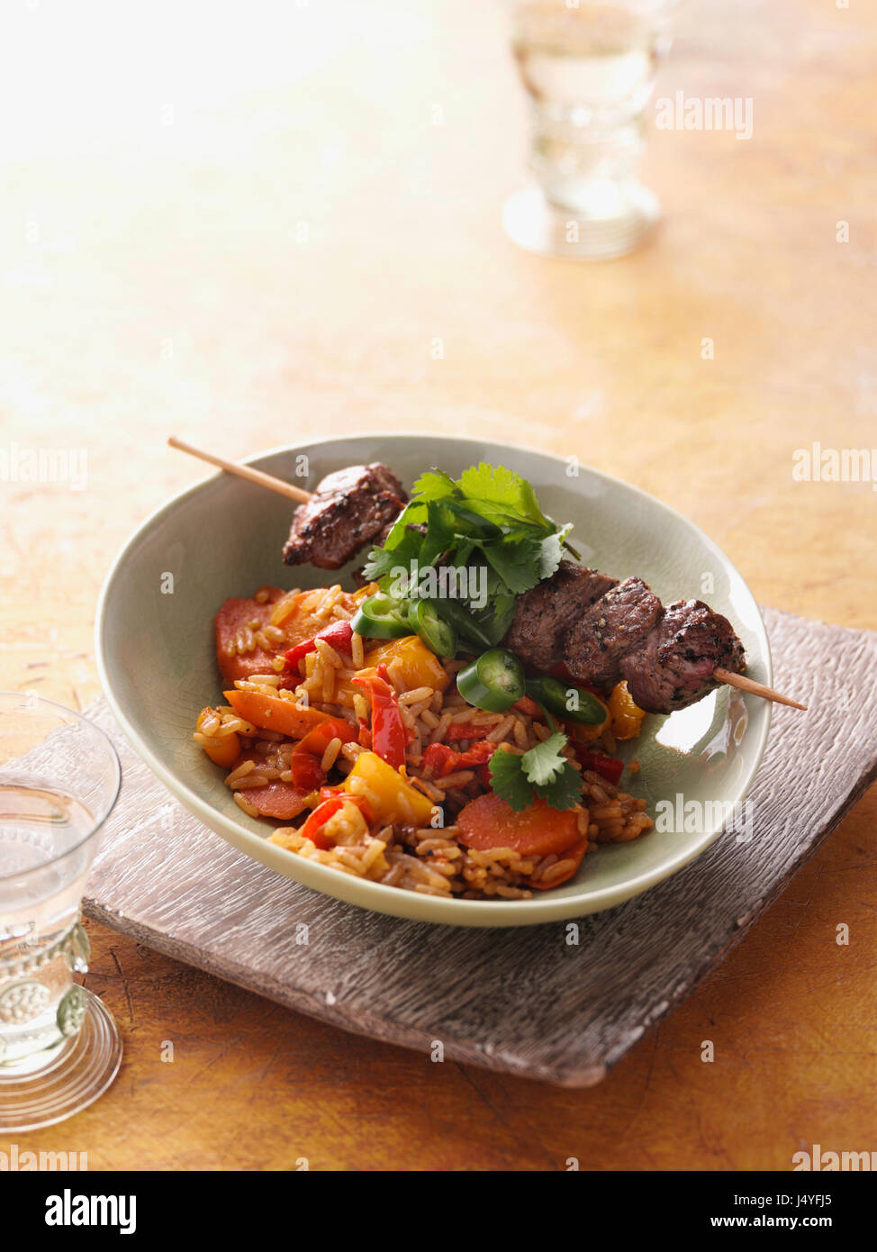 Beefsteak-spit with vegetables and rice Stock Photo - Alamy