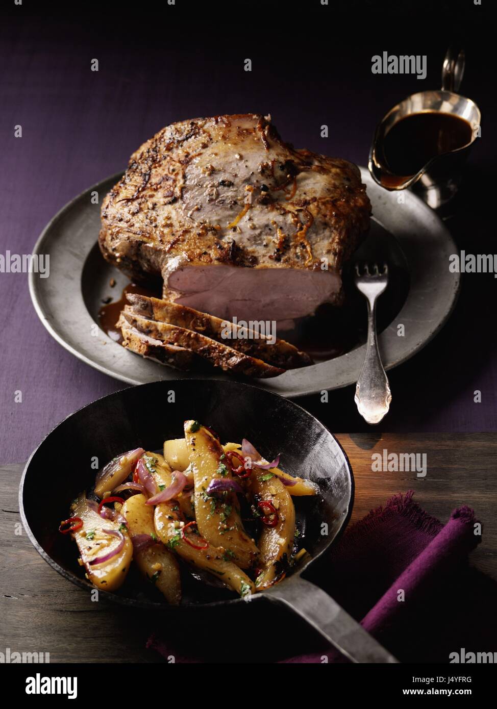 Roast wild boar with ginger pears Stock Photo - Alamy