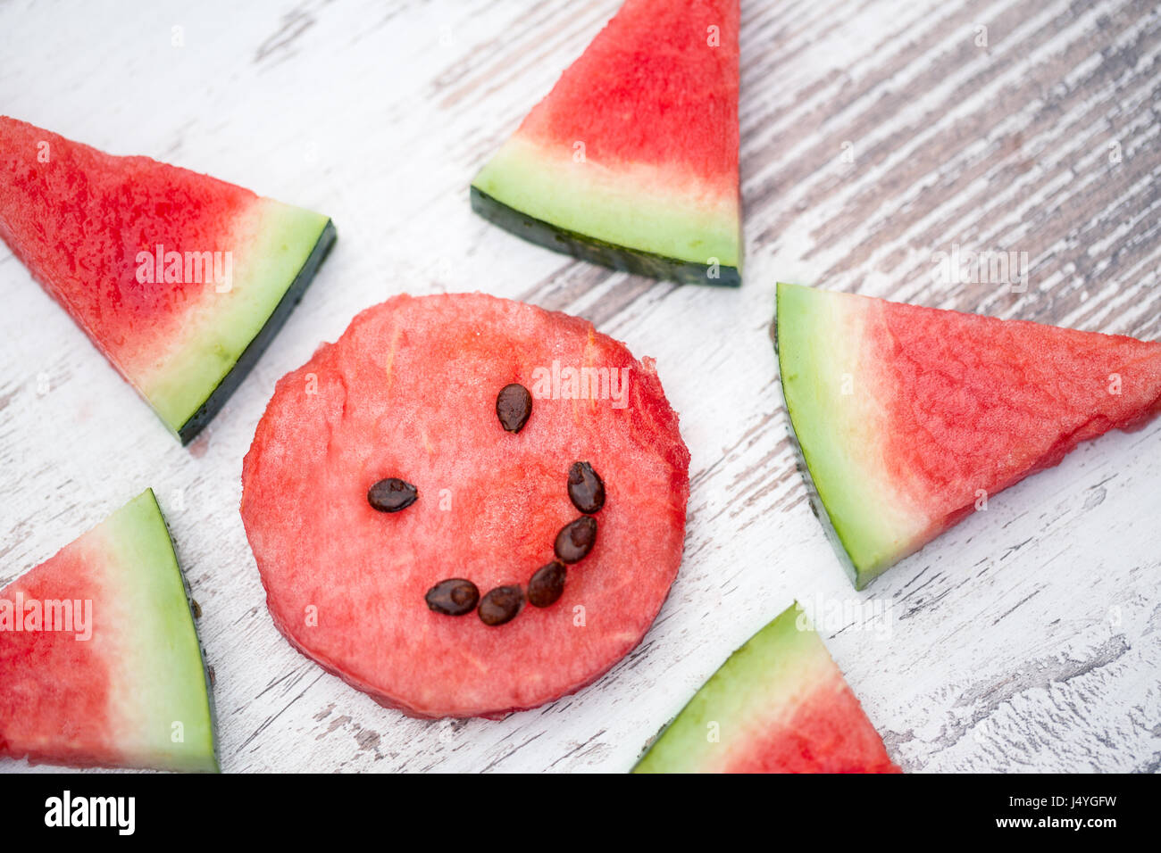 funny decorated slices of watermelon Stock Photo - Alamy