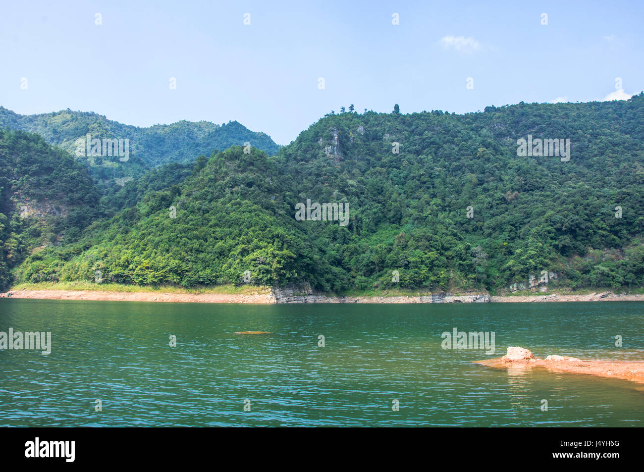 The reservoir scenery with blue sky in summer Stock Photo - Alamy
