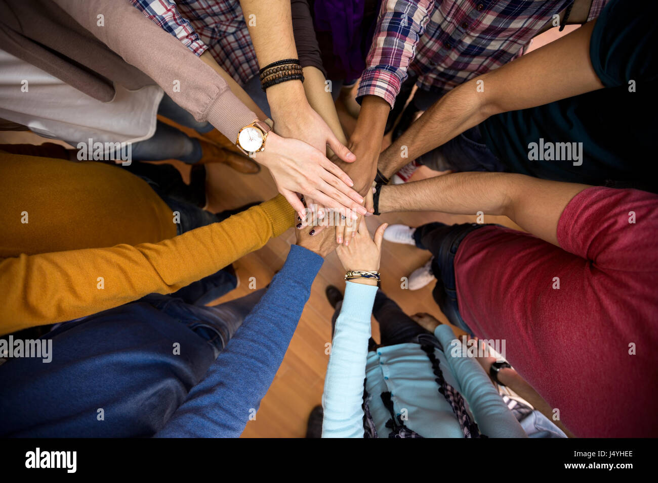 Unit and concord in multiethnic team, all hands together Stock Photo ...