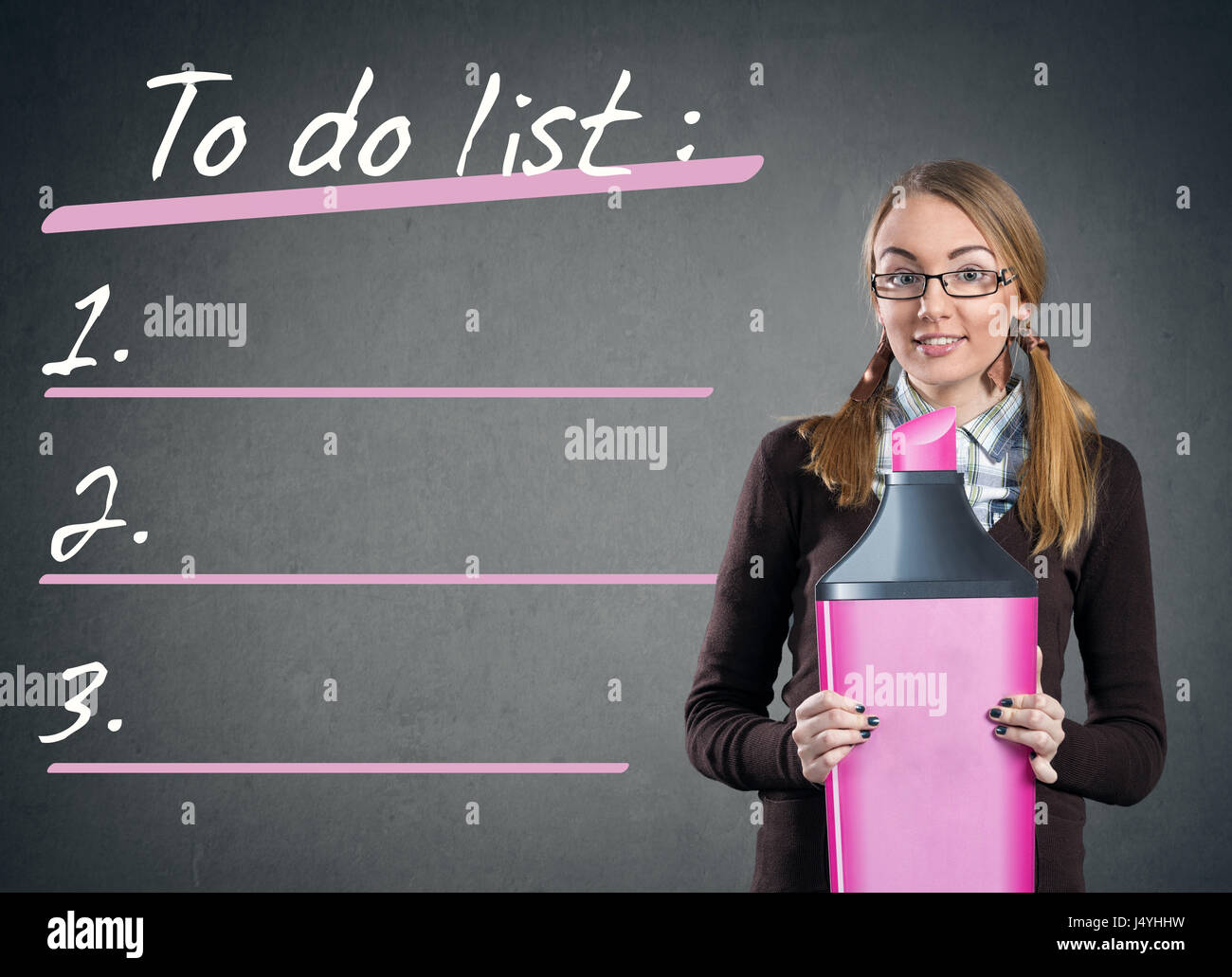 Beautiful teen girl with big marker and to do list Stock Photo - Alamy