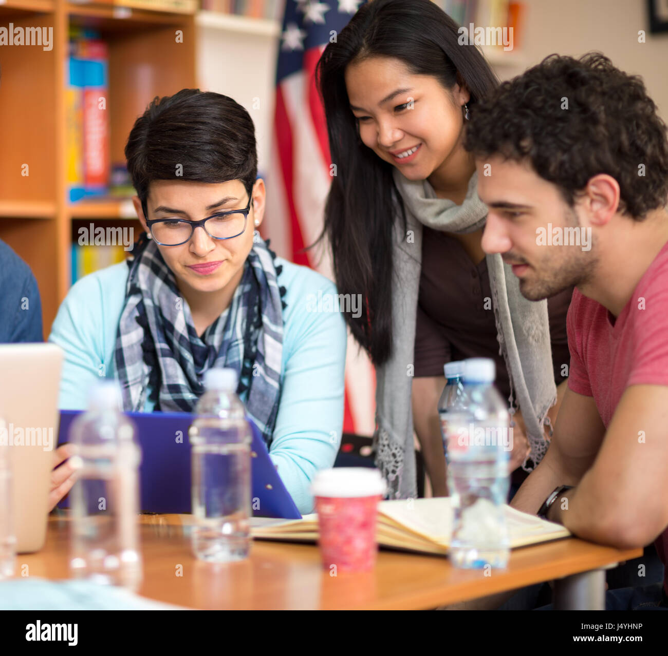 Team group talking about task Stock Photo - Alamy