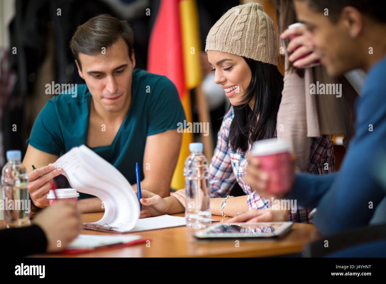 College students exchanging notes hi-res stock photography and images ...