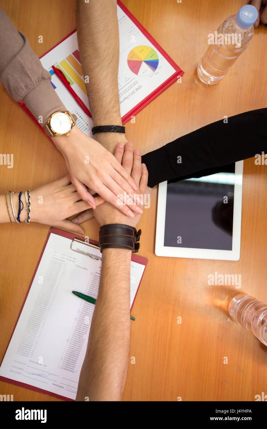 Multiethnic hands together team unity concept Stock Photo - Alamy