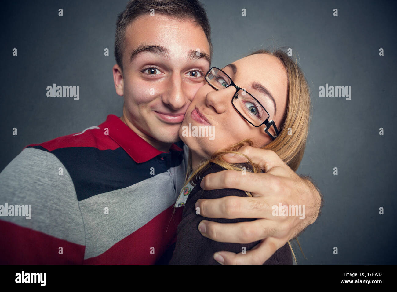Young funny couple hugging Stock Photo - Alamy
