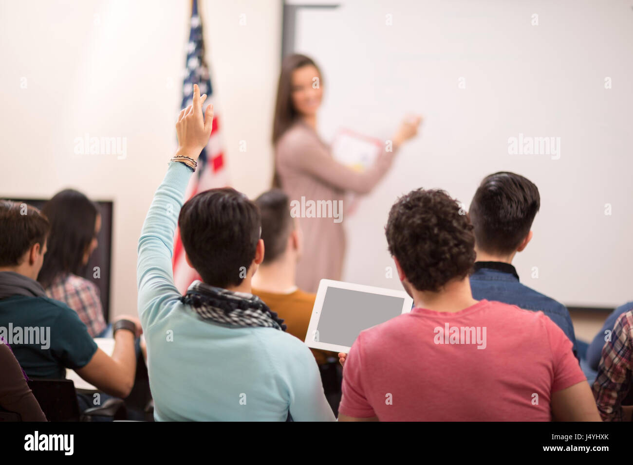 Female student active on lecture Stock Photo - Alamy