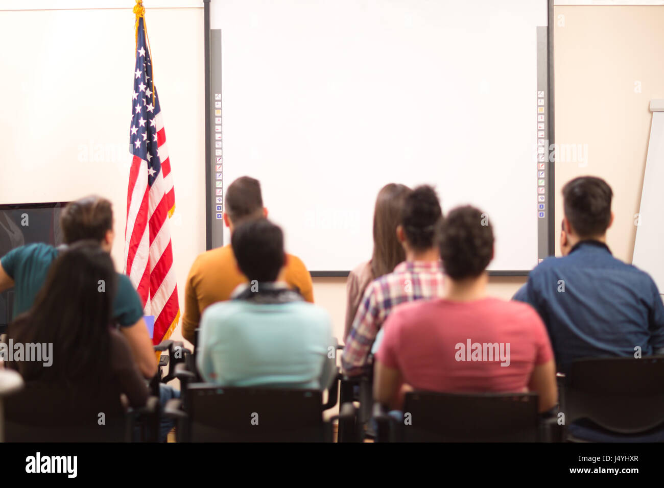 Back view young pupils hi-res stock photography and images - Alamy