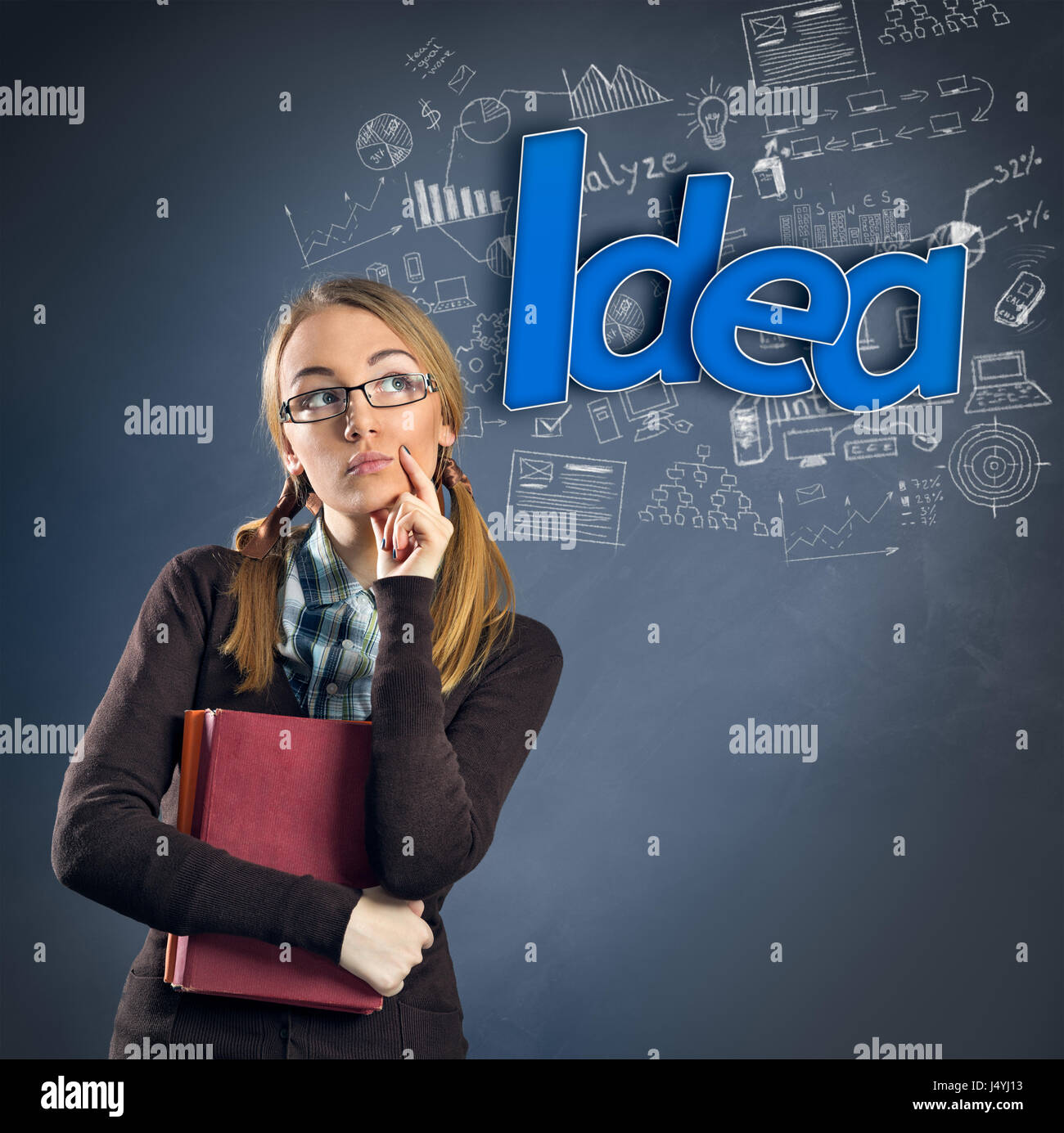 Thinking Schoolgirl have idea Stock Photo - Alamy