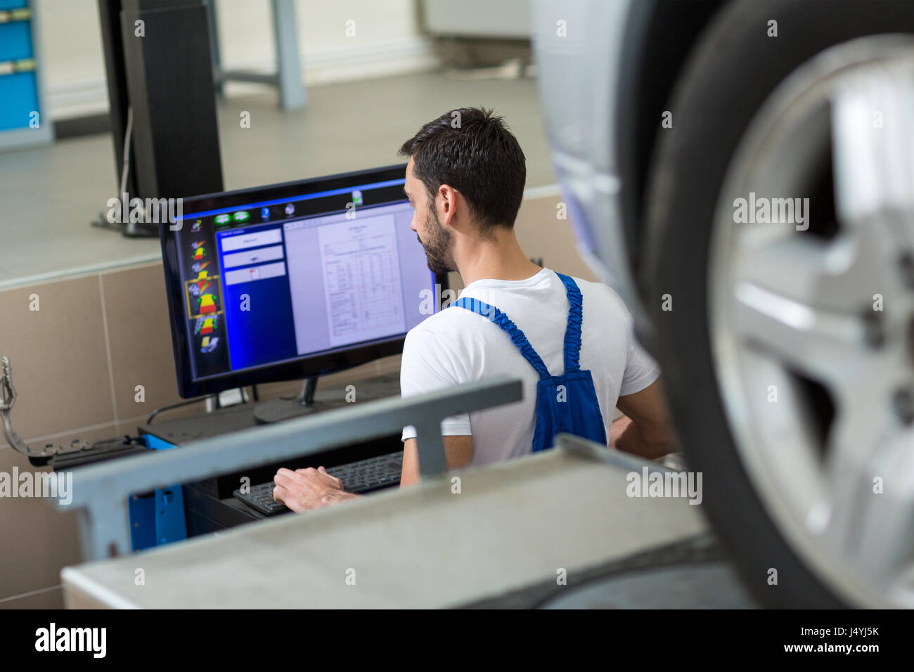 Man working in car typing hi-res stock photography and images - Alamy