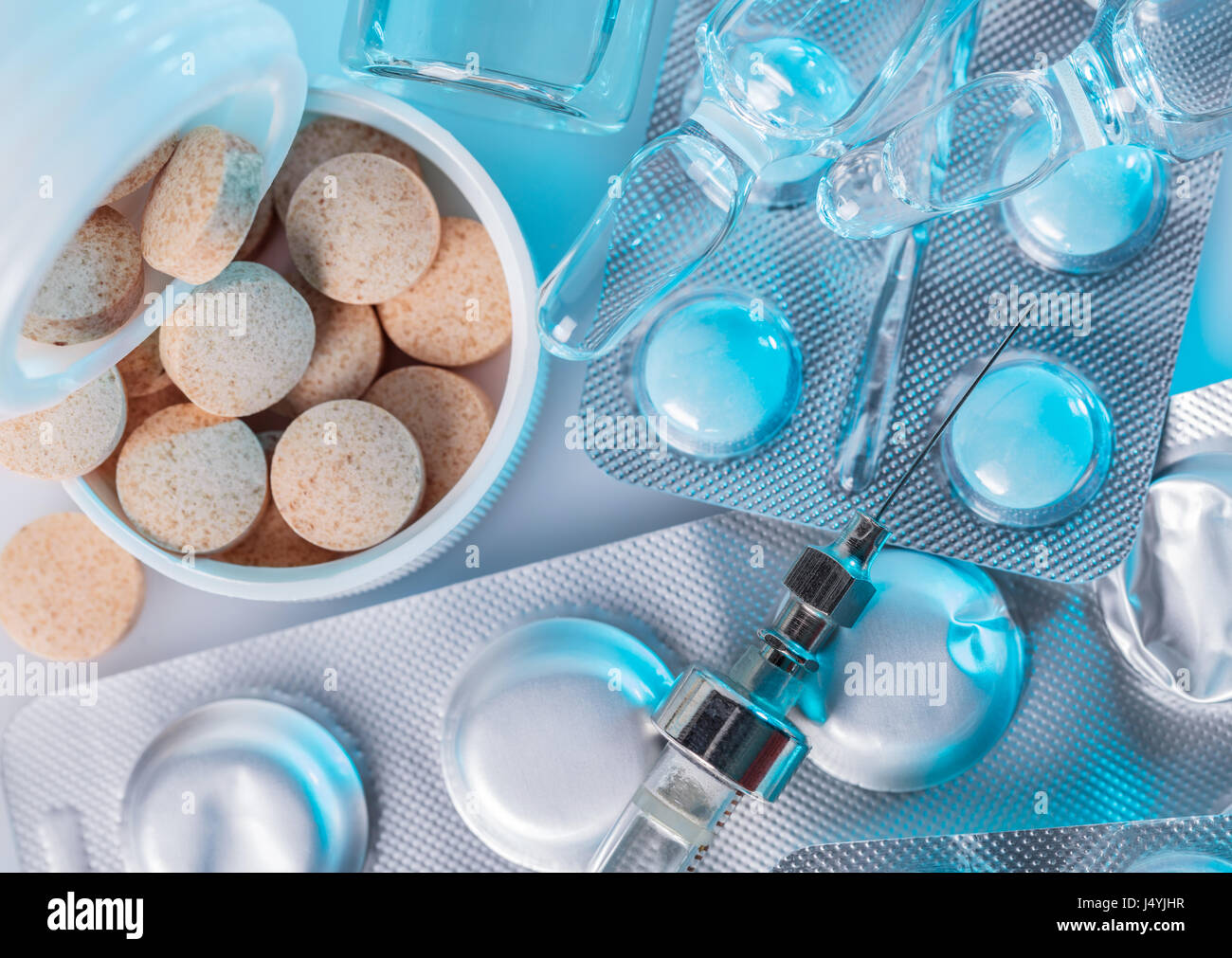 background, a variety of medical drugs and syringe closeup Stock Photo ...