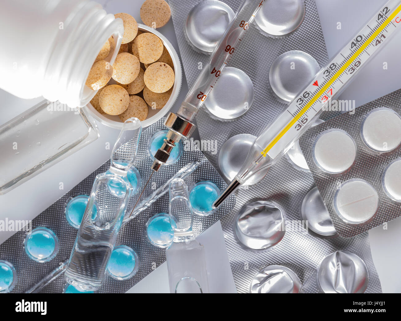 background, a variety of medical drugs and syringe closeup Stock Photo ...