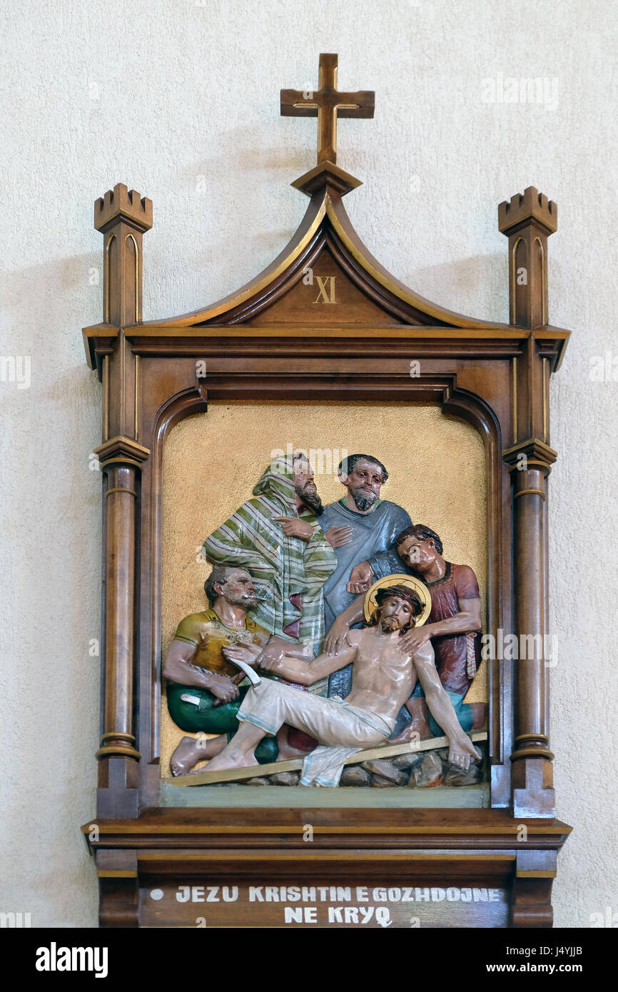 11th Stations of the Cross, Crucifixion: Jesus is nailed to the cross, Mother Teresa cathedral ...