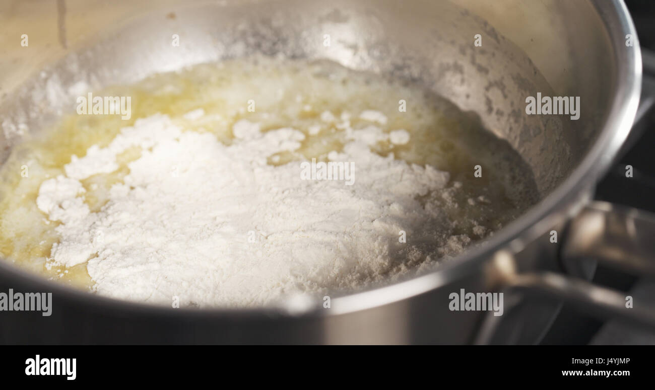 Adding bechamel sauce hi-res stock photography and images - Alamy