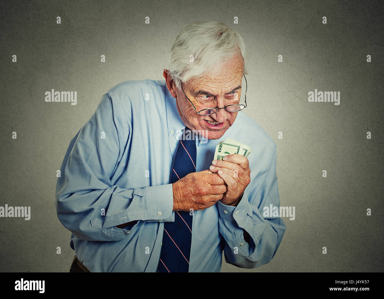 Closeup portrait greedy senior executive, CEO, boss, old corporate ...