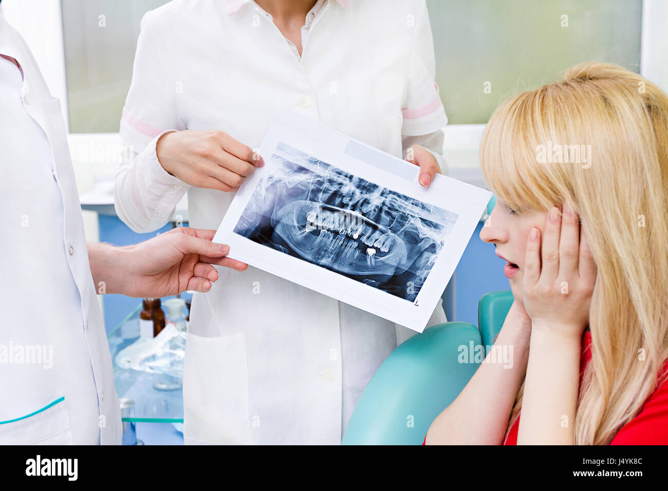 Closeup portrait worried scared female patient, woman siting in chair ...