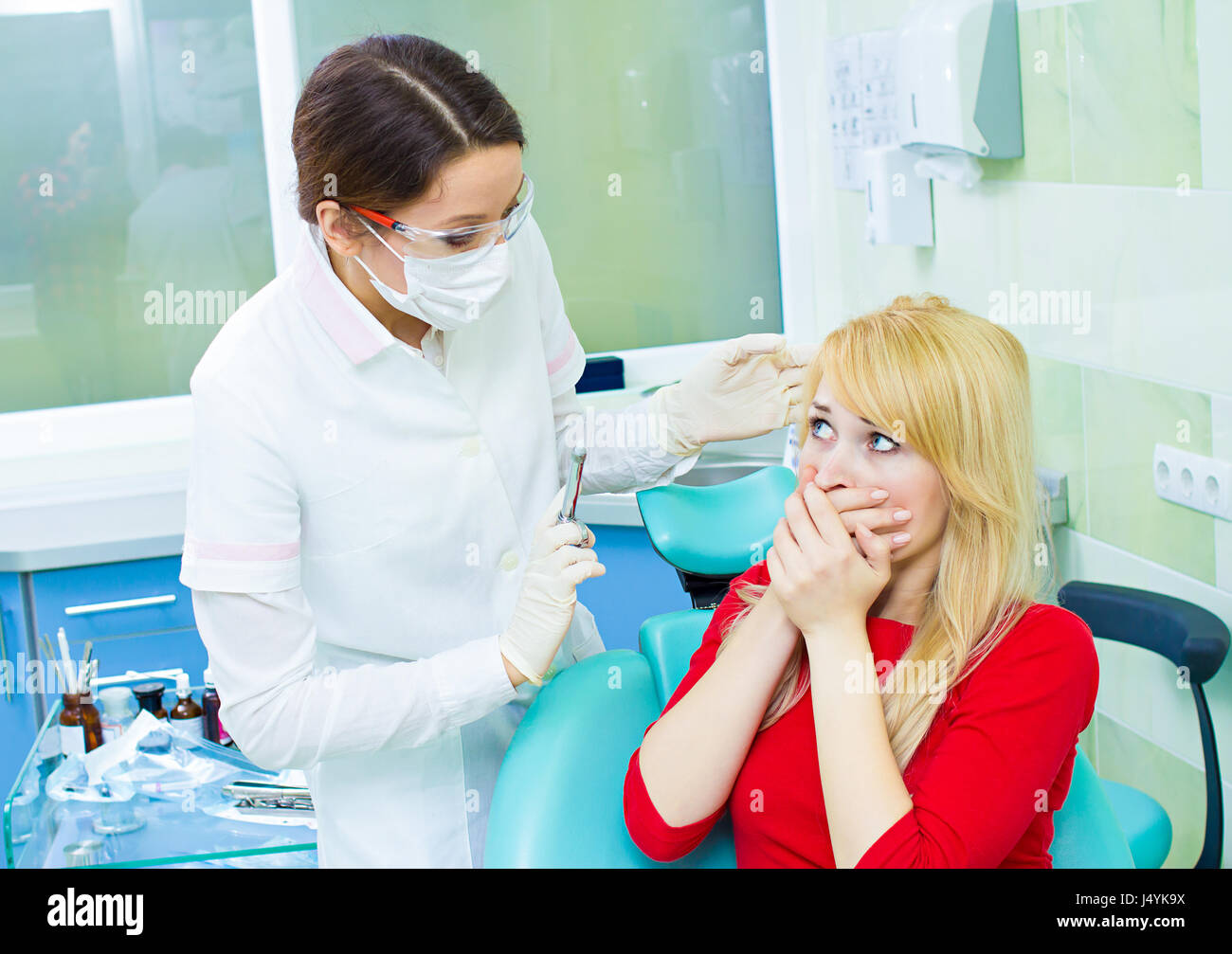 Closeup portrait terrified girl woman scared of needles, syringes ...
