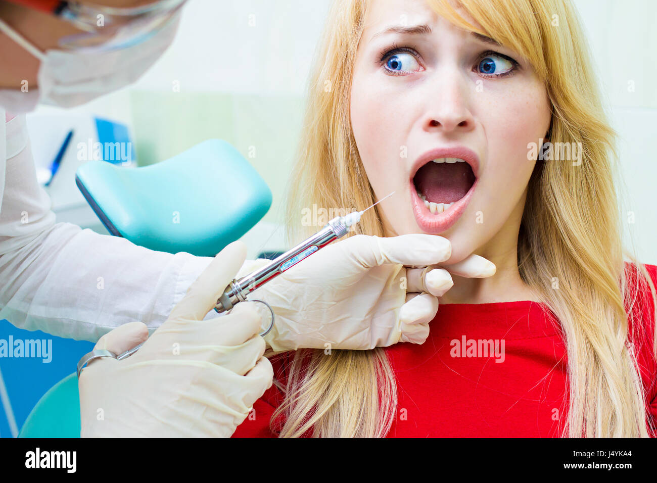 Closeup portrait terrified girl woman scared of needles, syringes ...