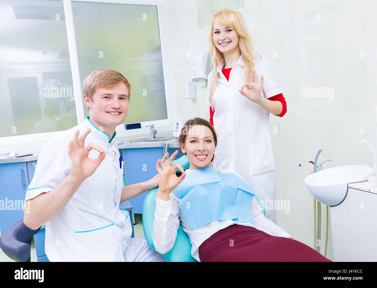 Group portrait happy health care professionals dentist assistant ...